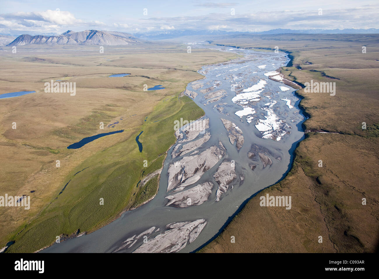 Aerial of the Canning River and the Shublik Mountains along the coastal ...