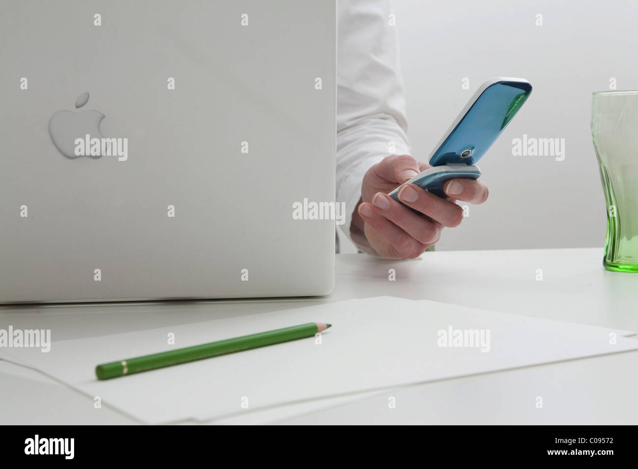 Mobile phone call, computer Stock Photo - Alamy