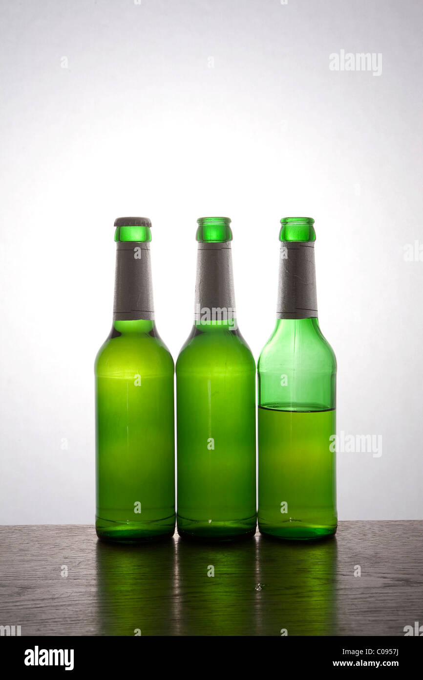Three beer bottles Stock Photo - Alamy