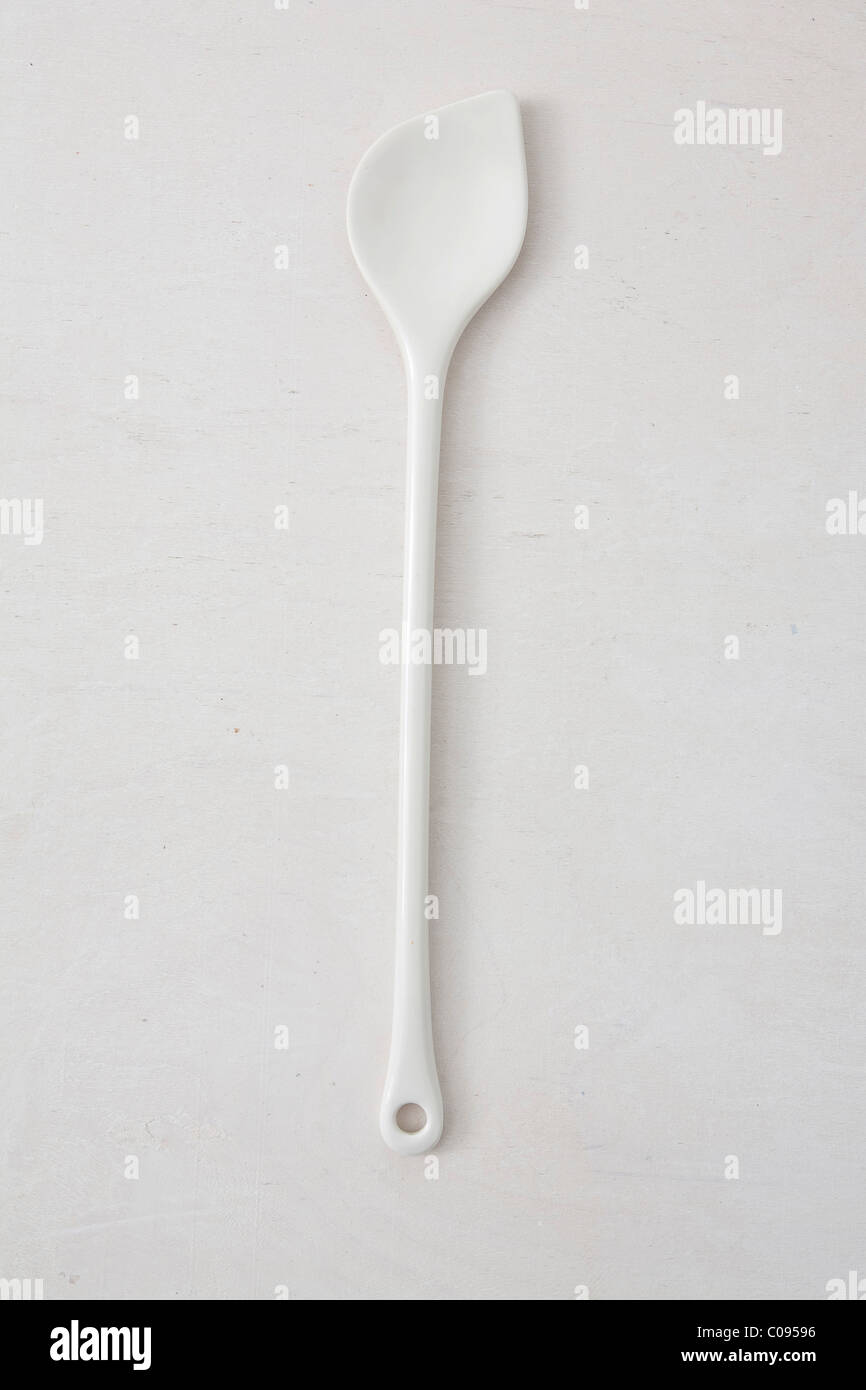 White cooking spoon Stock Photo - Alamy
