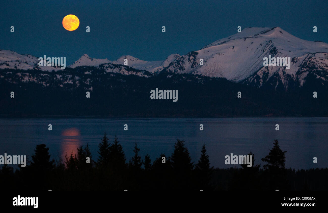 View of a full moon rising over Kachemak Bay near Homer, Kenai ...