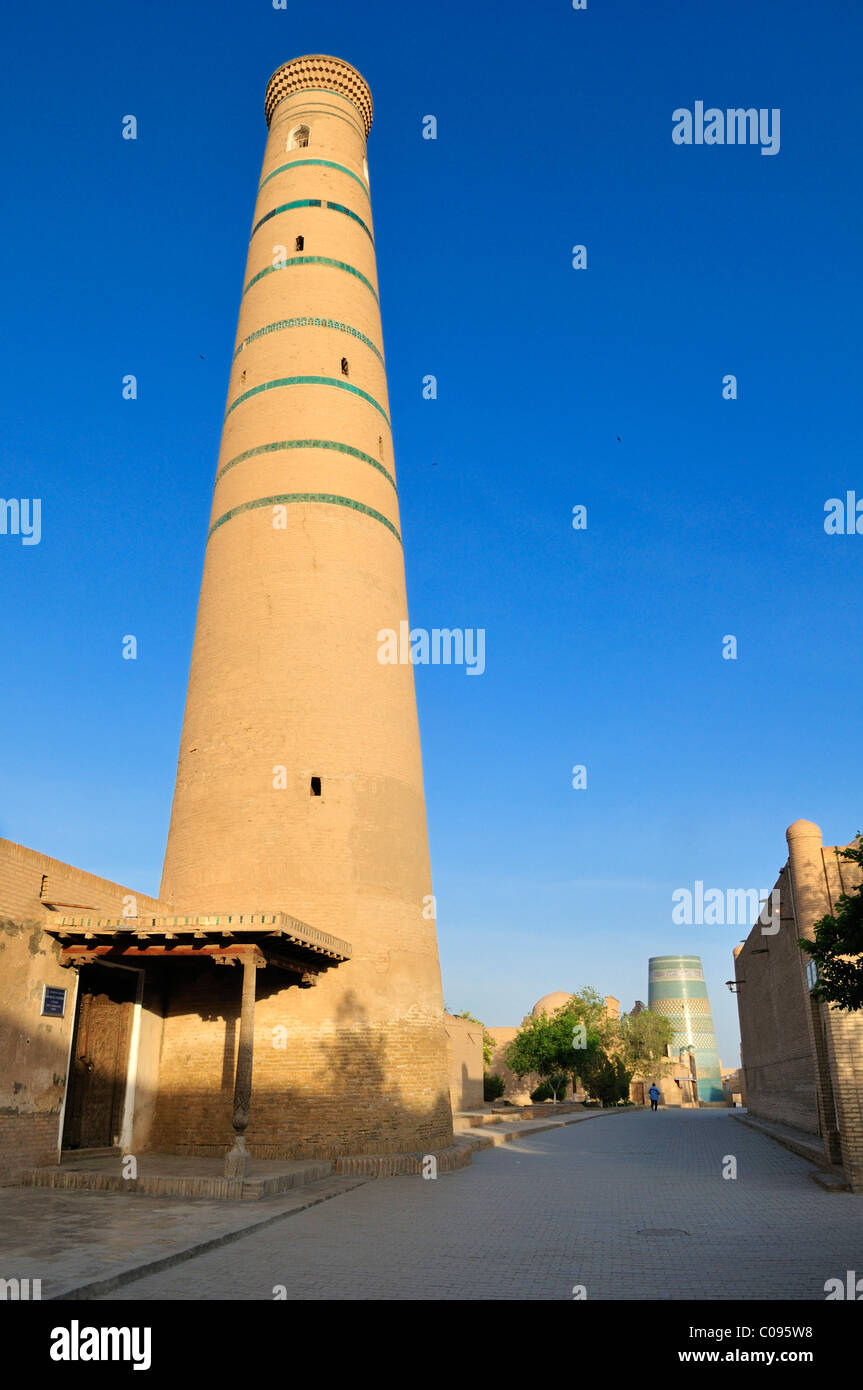 Minaret of the Djuma, Juma mosque in the historic adobe town of Khiva ...