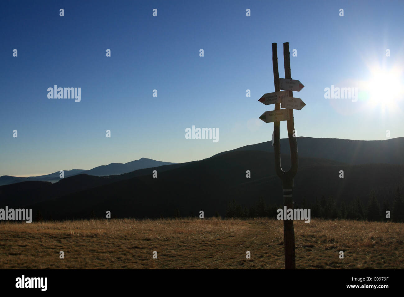 Direction sign on a mountain hiking trail. Beskidy Mountains. Poland ...