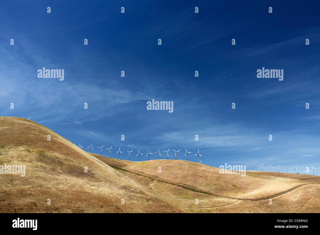 Dry mountain hill with windmills, California, USA Stock Photo - Alamy