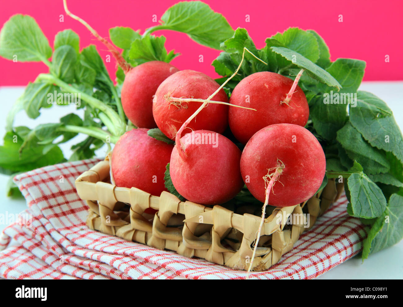 bunch of red ripe radish on the organic background Stock Photo - Alamy