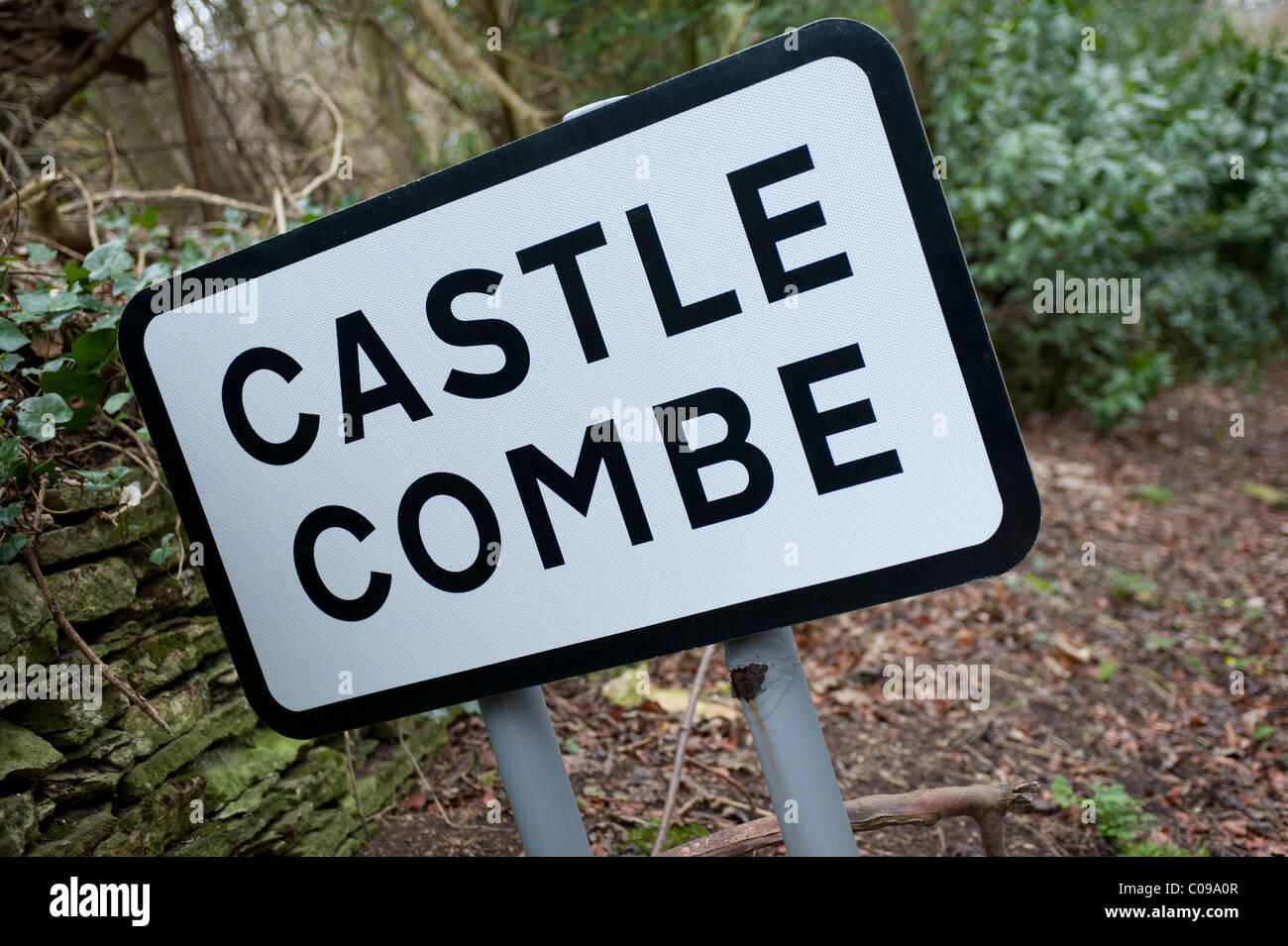 A road sign signaling the entrance to Castle Combe, the famous English ...