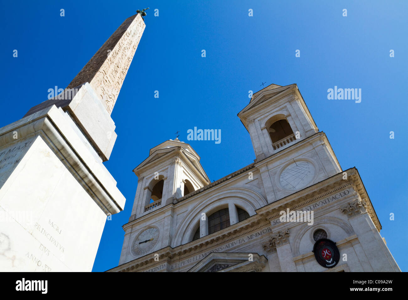 Obelisk and church steeples near the Spanish Steps in Rome, Italy ...