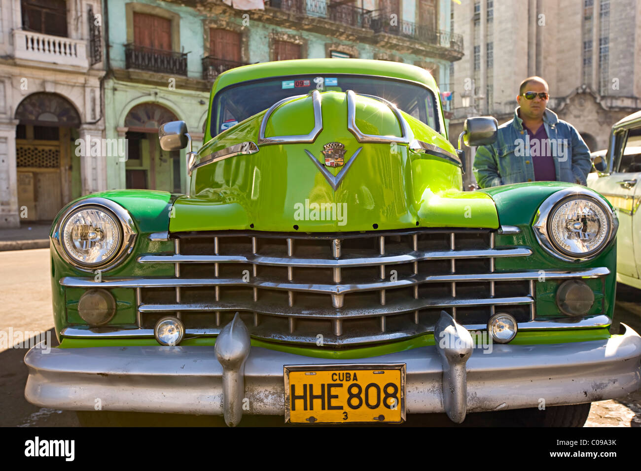 An old American 1950s green Cadillac automobile in a street in Havana ...