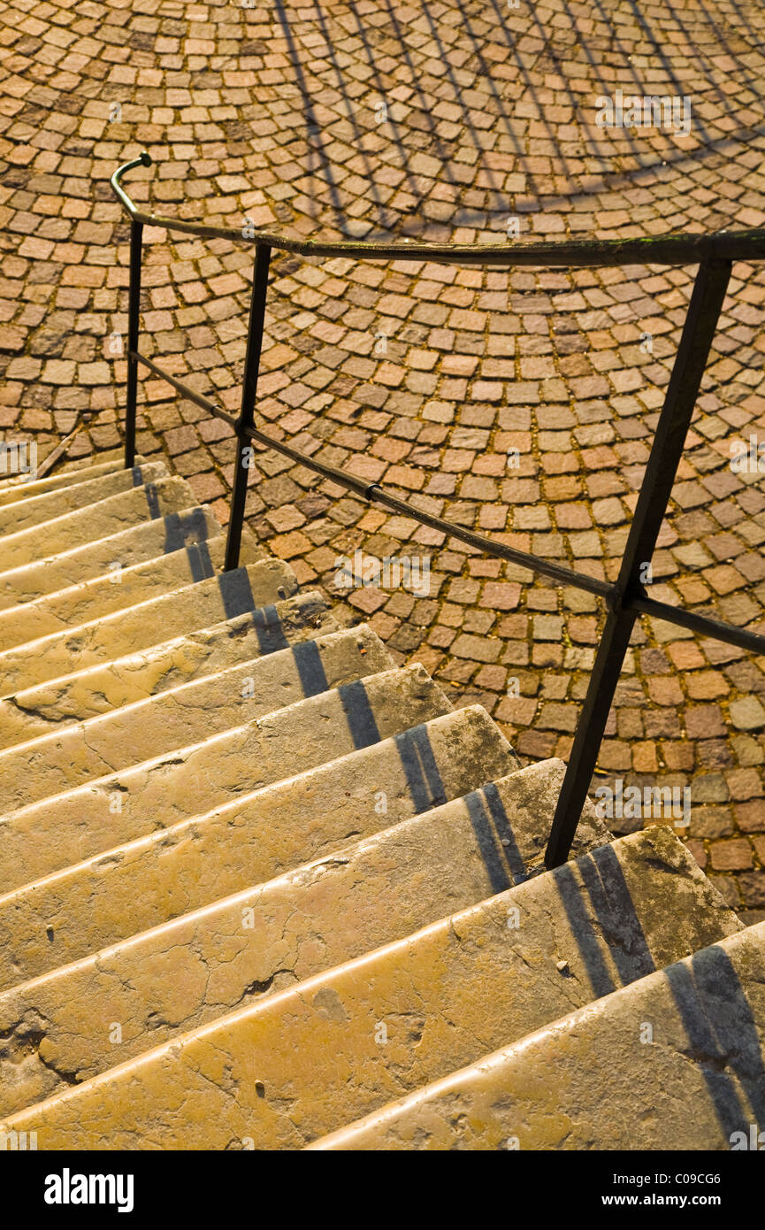 Abstract image of descending stairs with an iron handrail Stock Photo ...