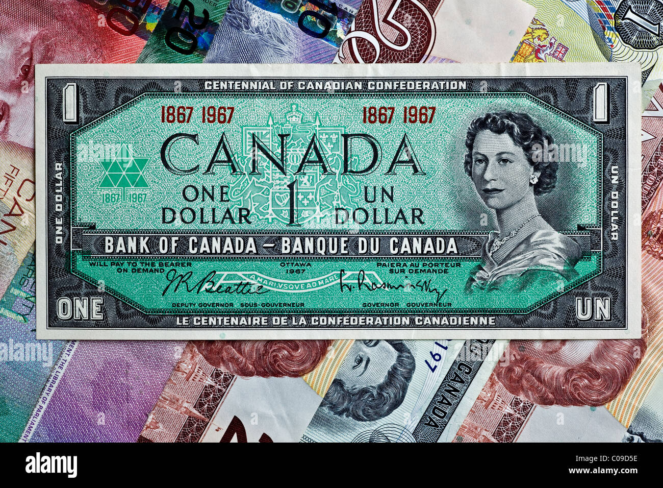 Canadian commemorative Centennial dollar bill on a diagonal selection ...