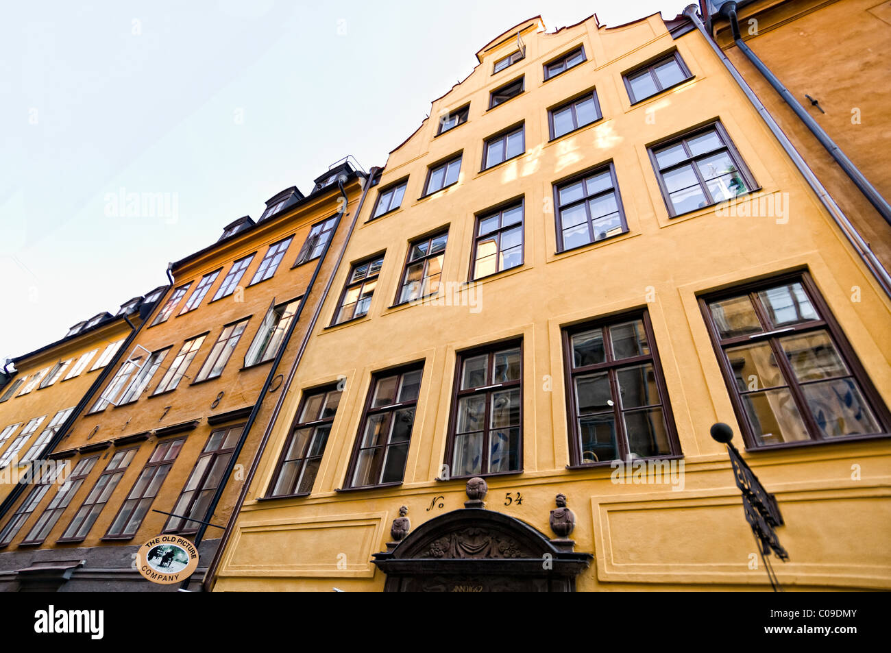 Old tall yellow buildings in Sweden Stock Photo - Alamy