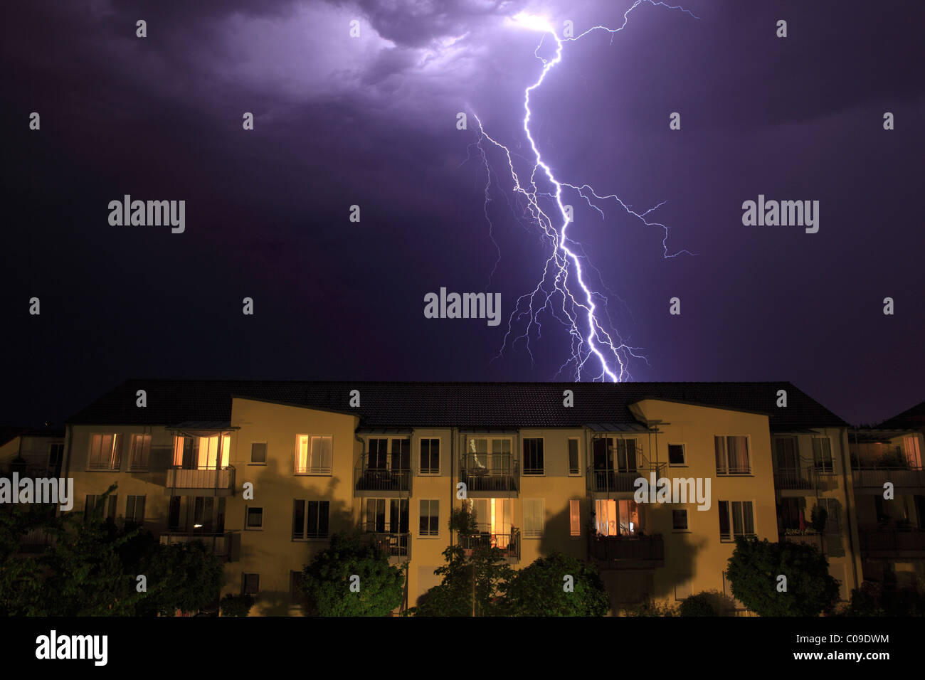 Thunderstorm lightning over houses hi-res stock photography and images ...
