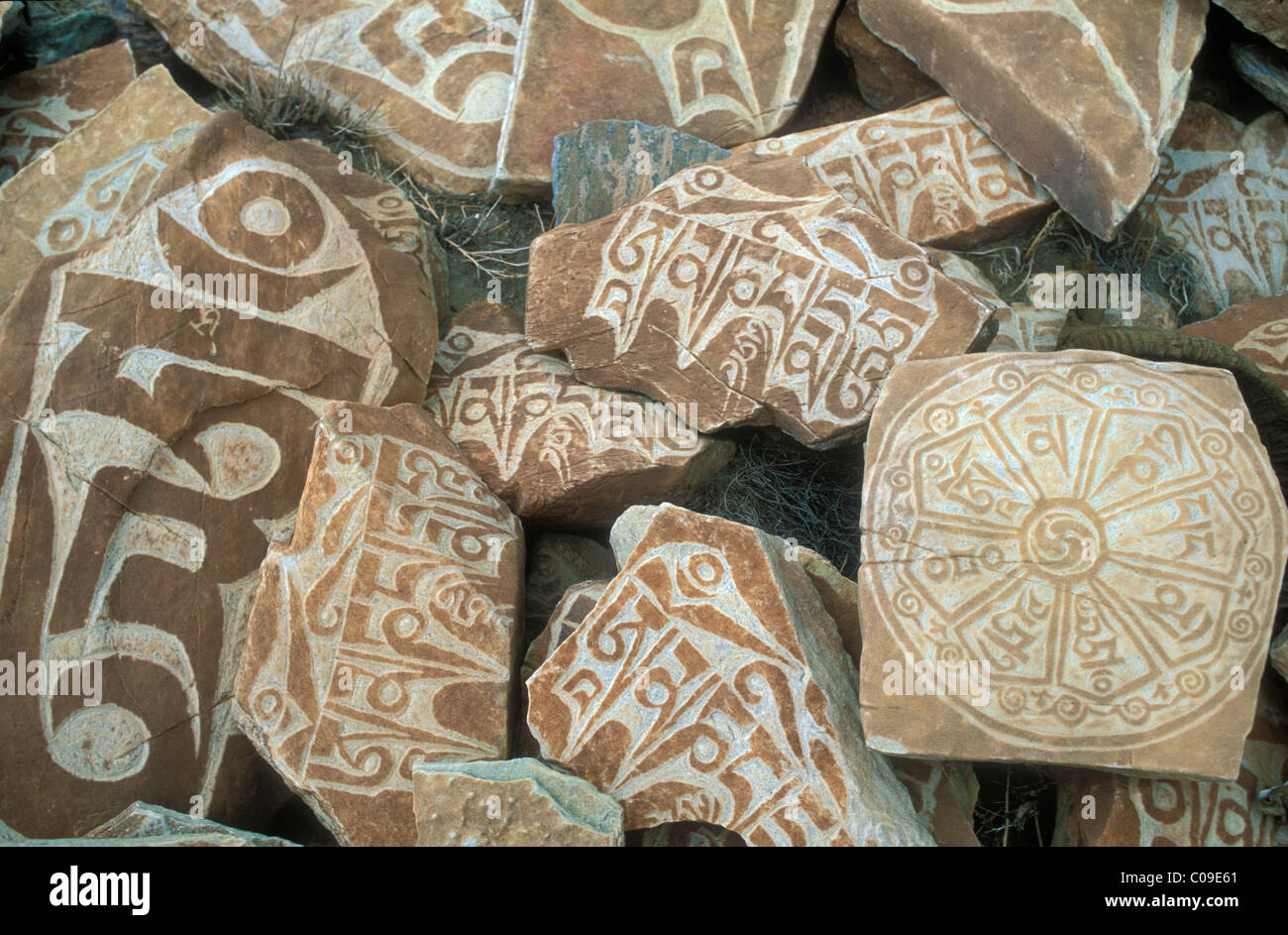 Buddhist Mani stones inscribed with sacred mantras, om mani padme hum ...