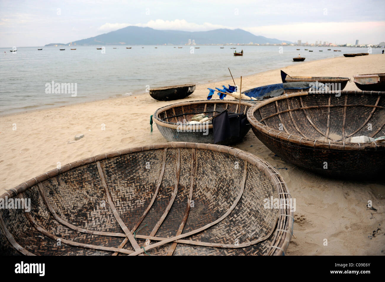 Round boats typical to the region on the beach of Danang, Central ...