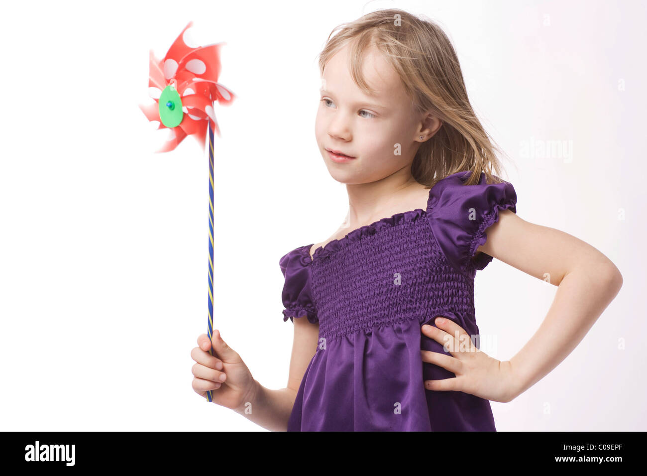 Girl with a pinwheel hi-res stock photography and images - Alamy