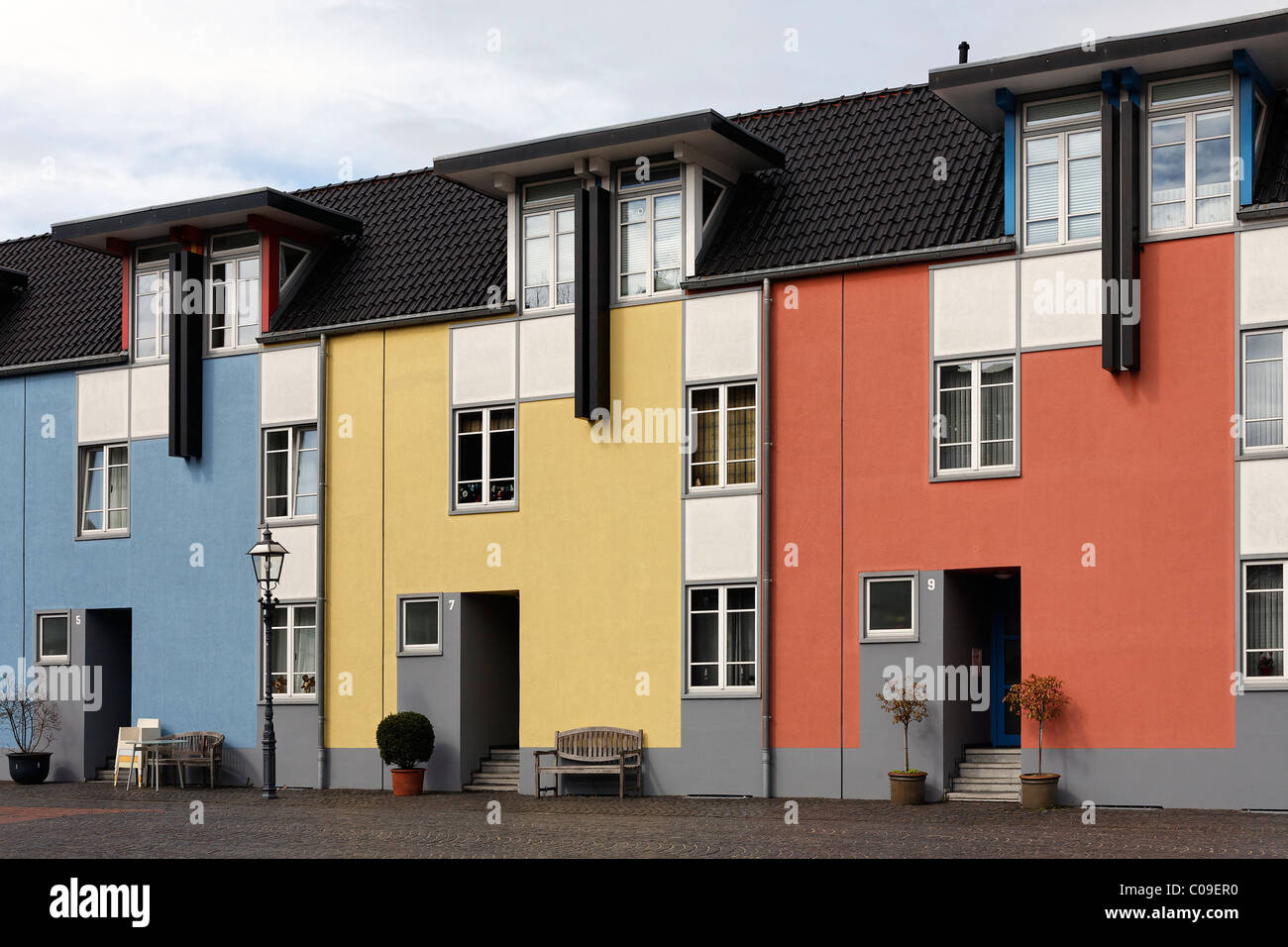 Three modern colorful row houses, Krefeld-Linn, North Rhine-Westphalia ...