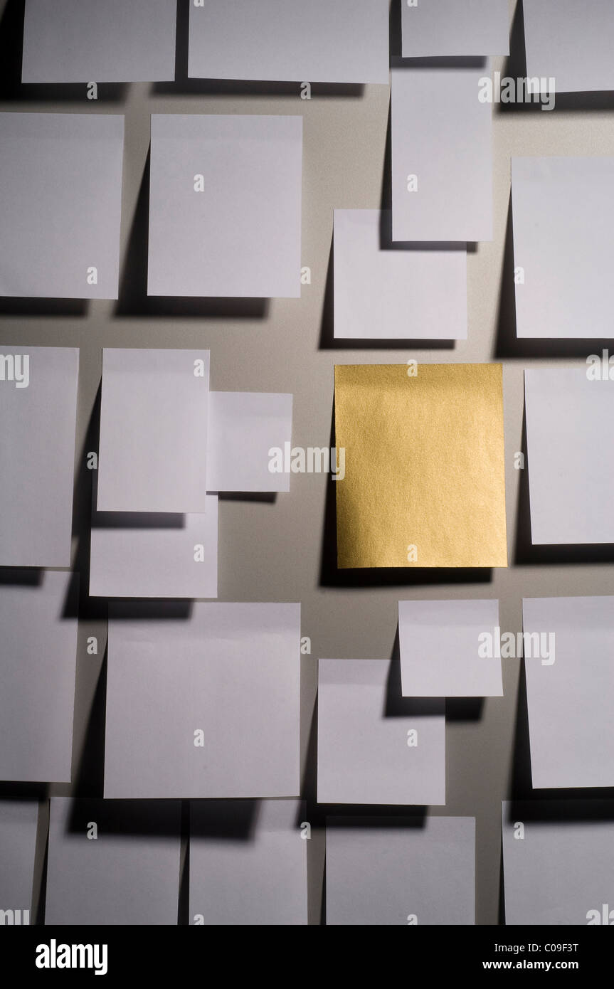 Golden post-it note Stock Photo - Alamy
