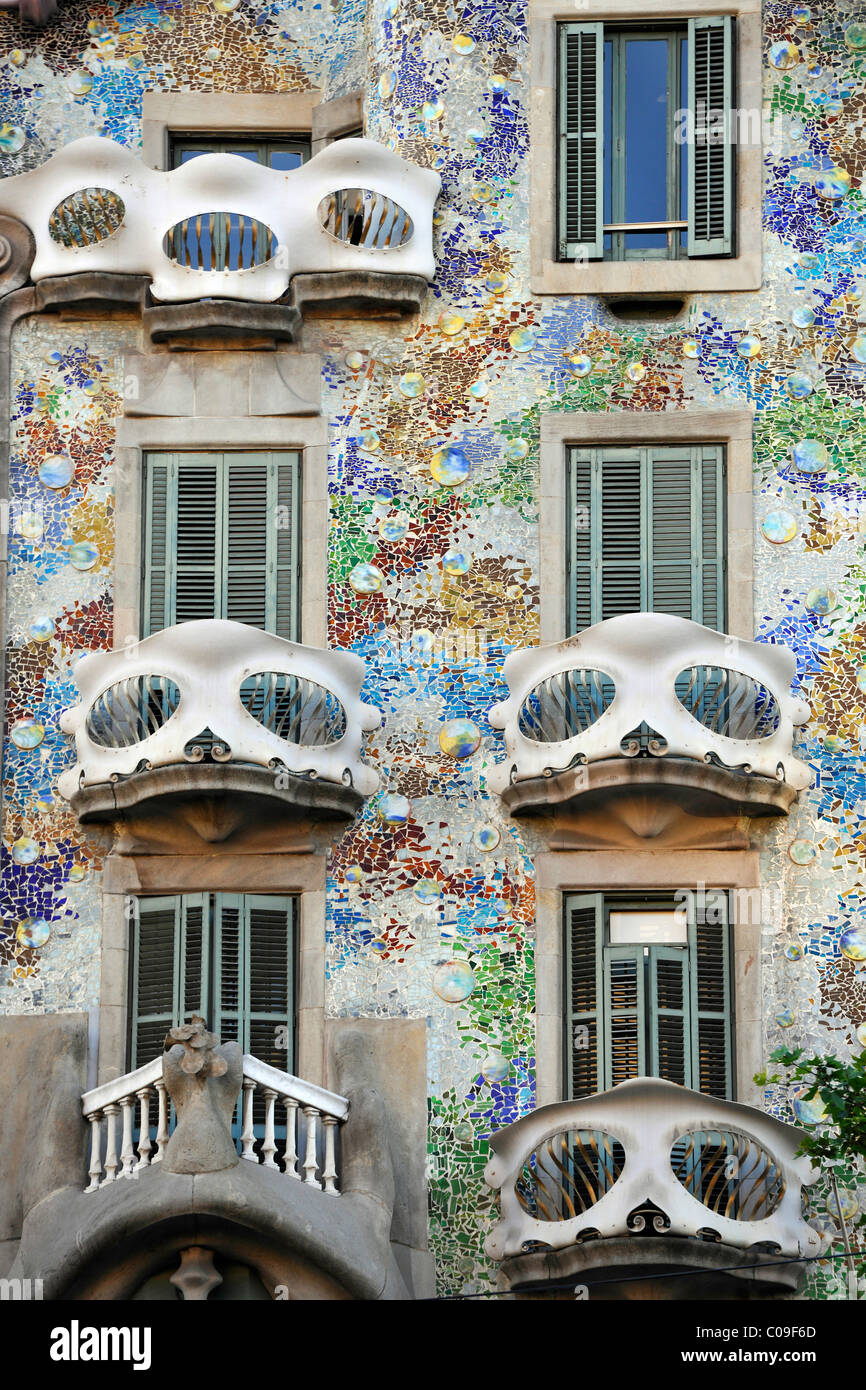 The wrought-iron balconies on the facade of the Casa Batlló building ...