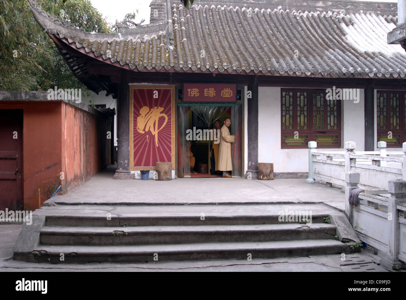 monks getting dressed Stock Photo - Alamy