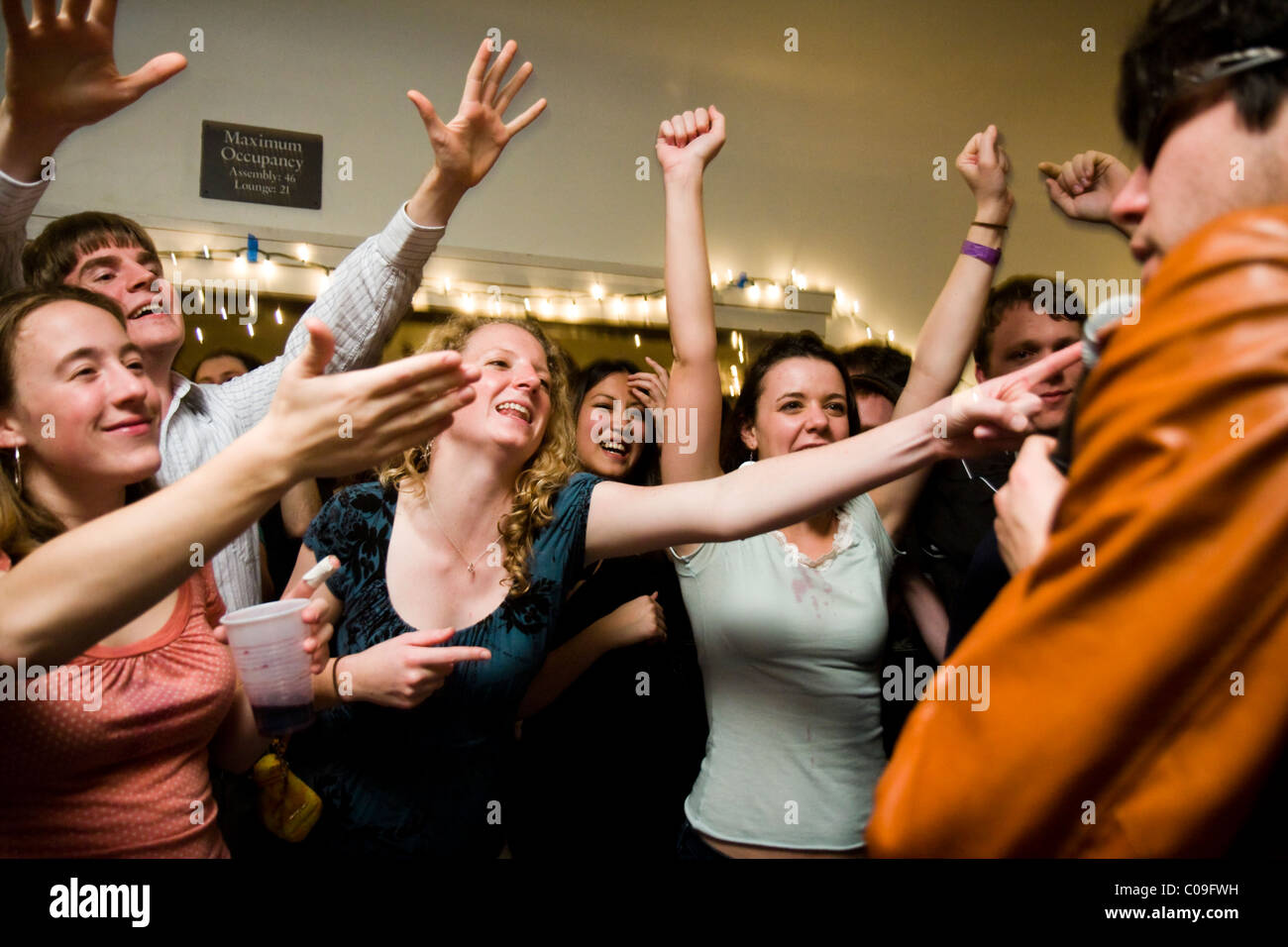 A student funk band performs at a house party in Stanford, California ...