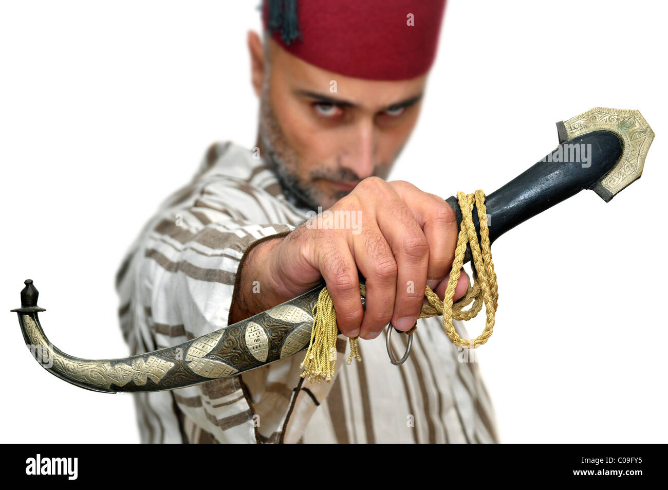 Arabic man with a dagger isolated in white Stock Photo - Alamy