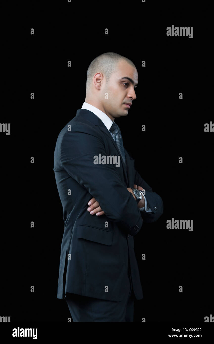 Side profile of a businessman thinking Stock Photo - Alamy