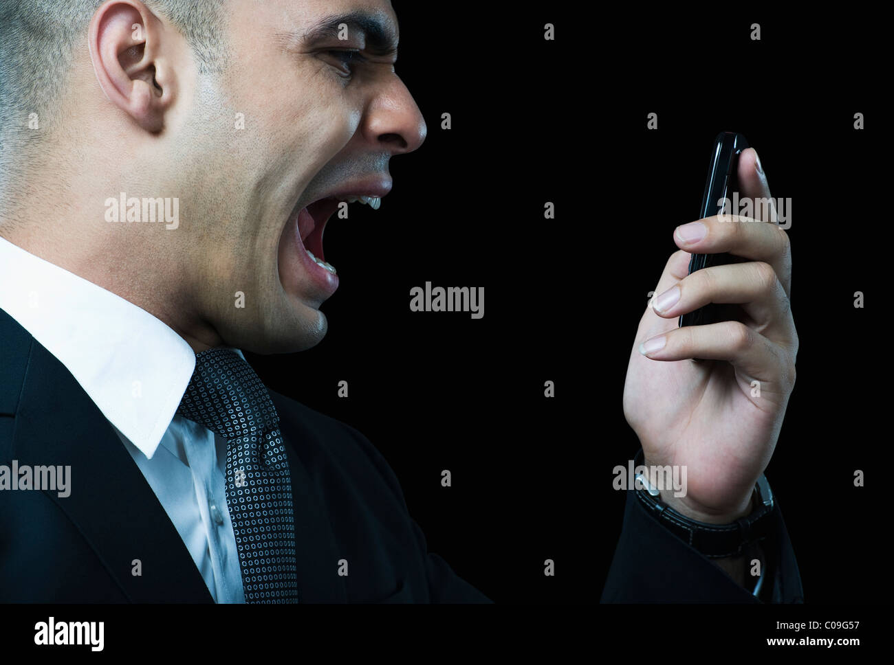Shouting down phone hi-res stock photography and images - Alamy