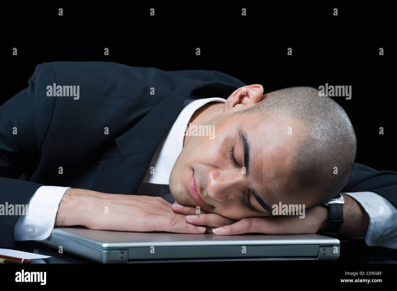 Indian businessman sleeping in office hi-res stock photography and ...