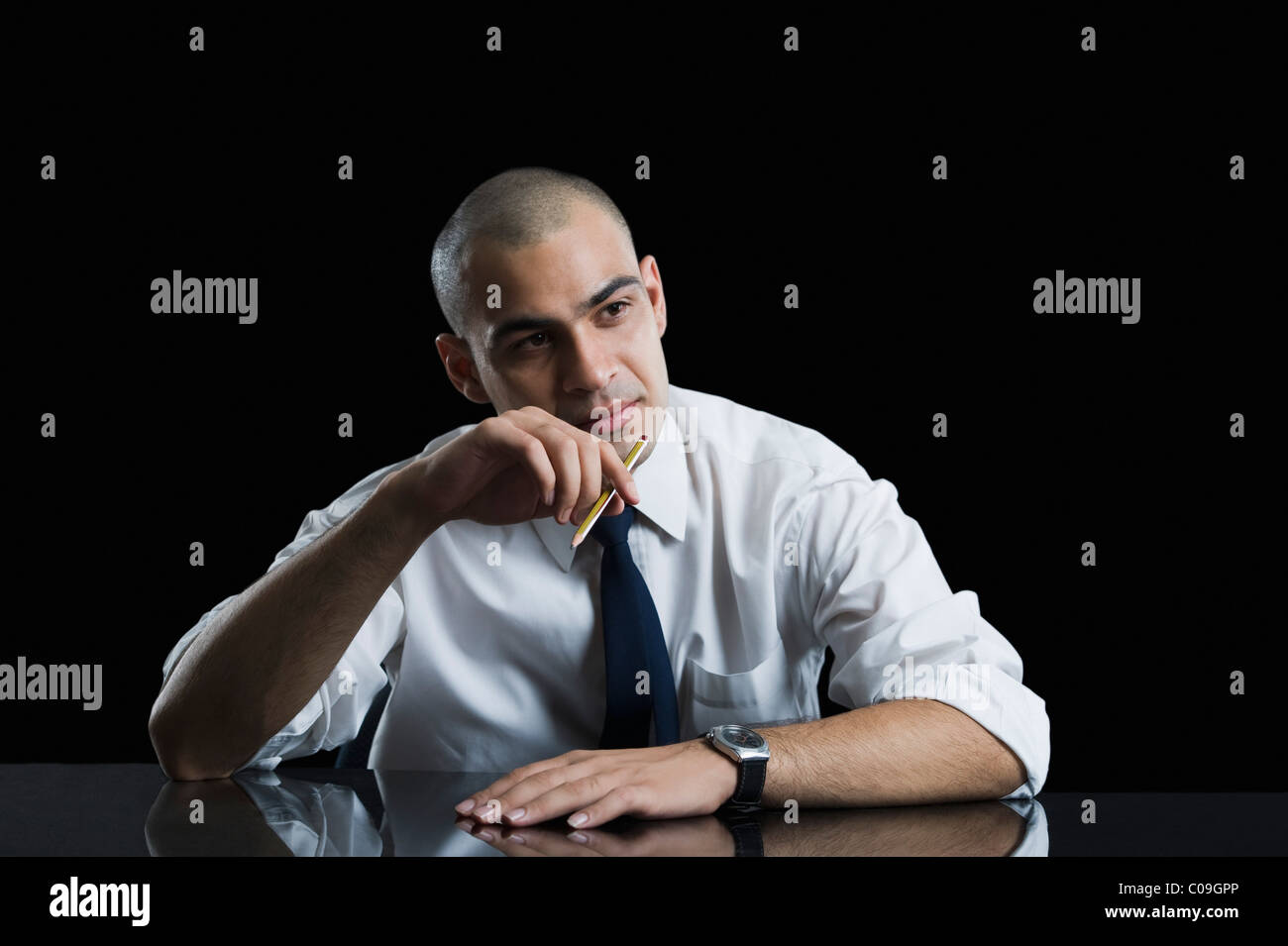 Person sitting table thinking hi-res stock photography and images - Alamy