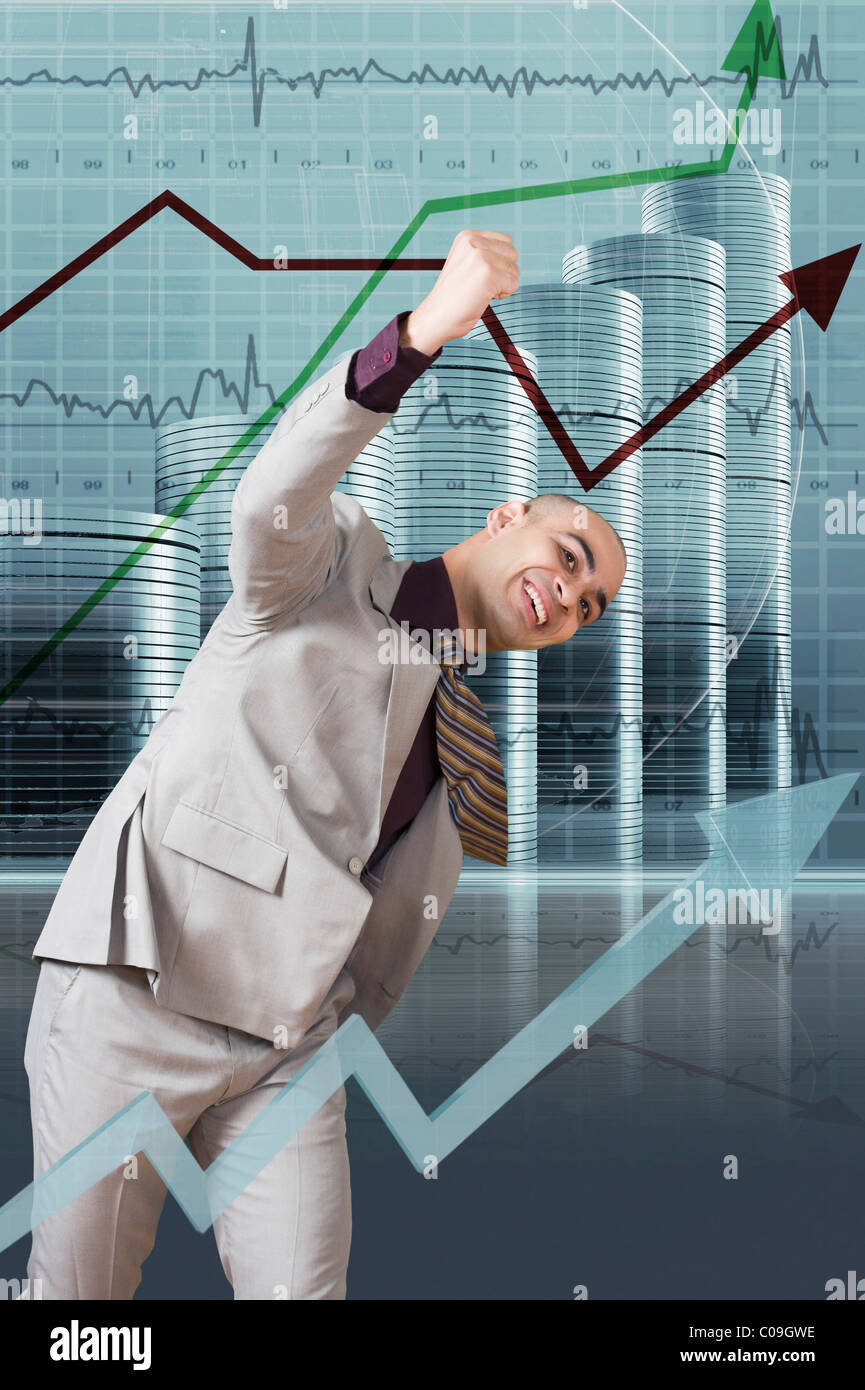 Businessman celebrating success Stock Photo - Alamy