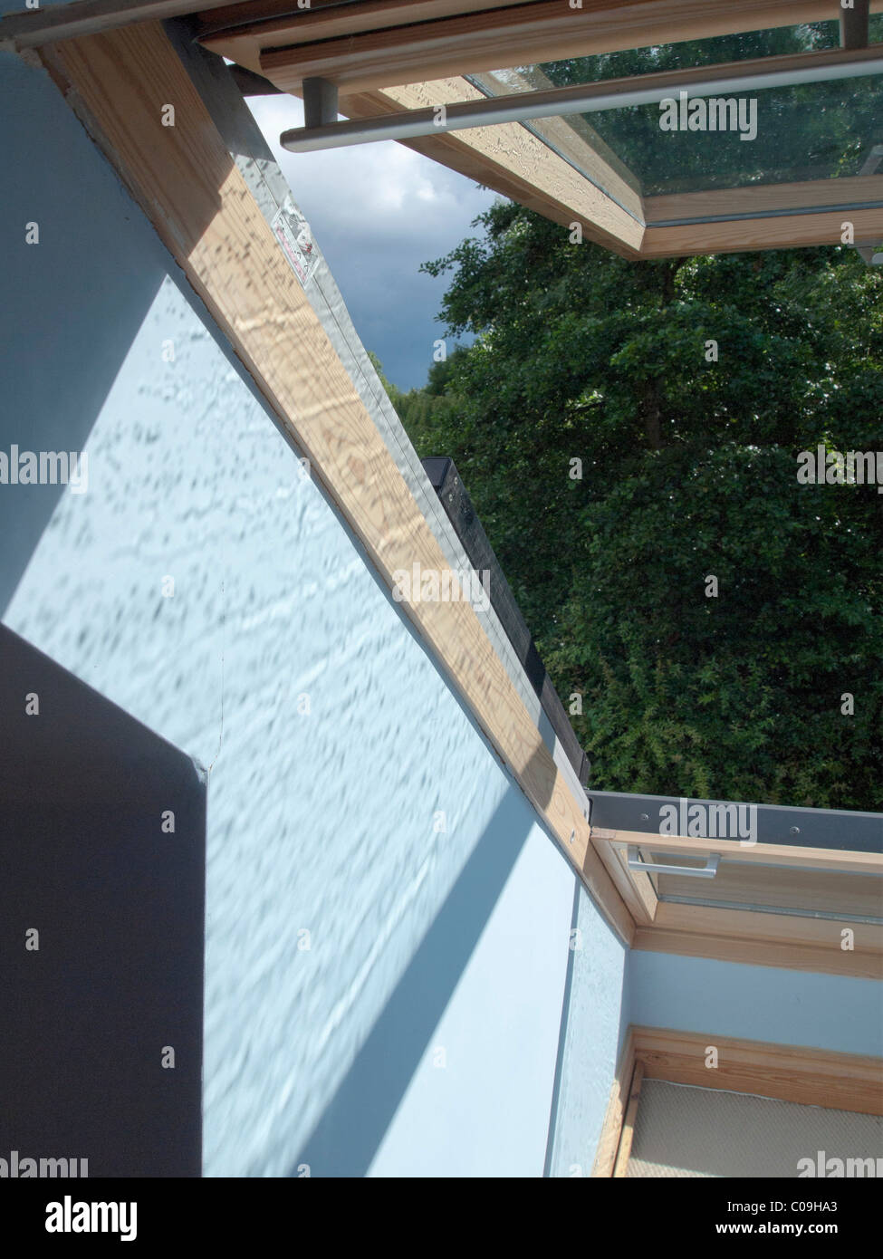 Windows in the roof of a house Stock Photo - Alamy