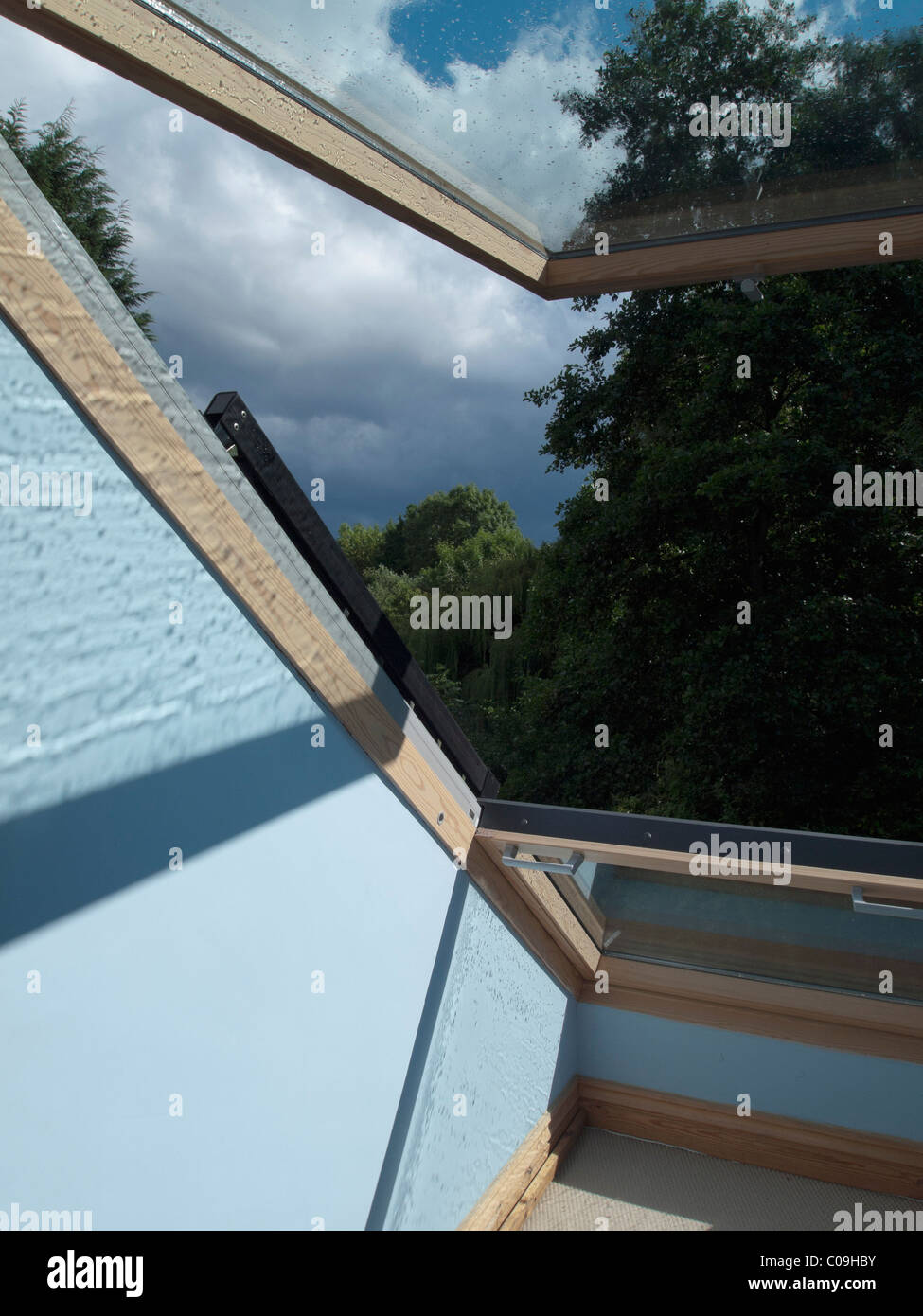 Windows in the roof of a house Stock Photo - Alamy