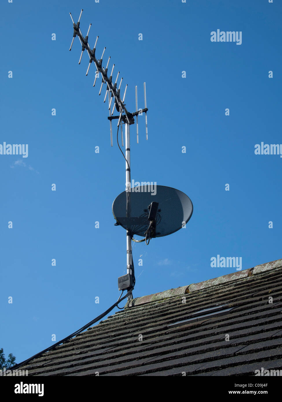 A satellite digital television arial on a roof Stock Photo - Alamy