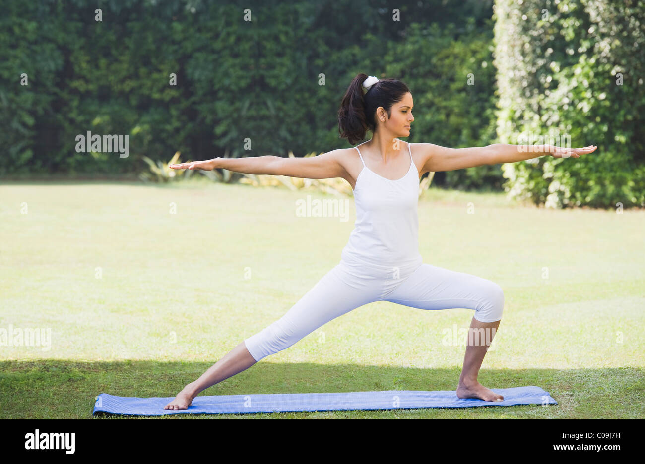 Woman doing Veerasana (Warrior Pose Stock Photo - Alamy