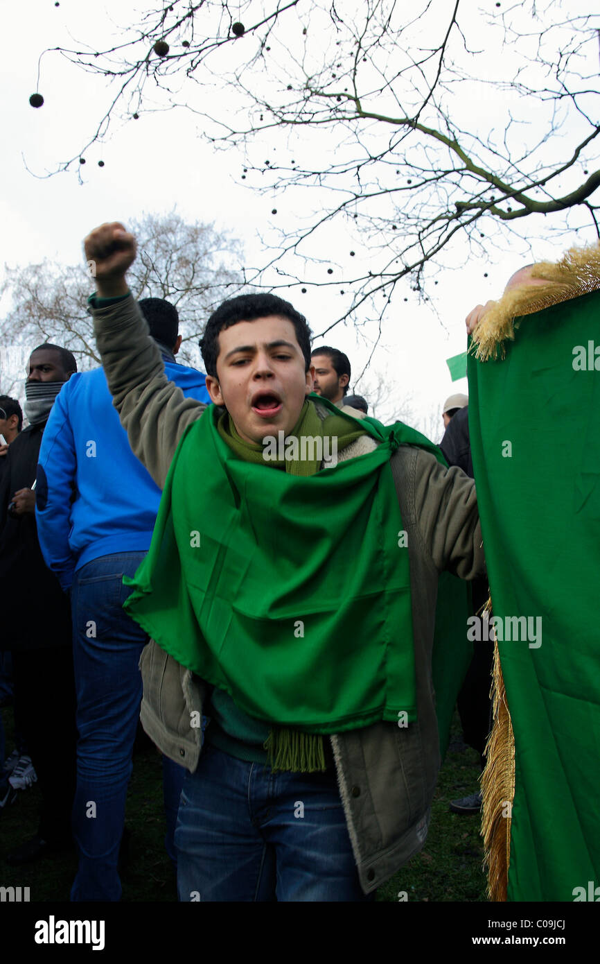 Pro Gaddafi regime protester shakes his fist at demonstration in London ...