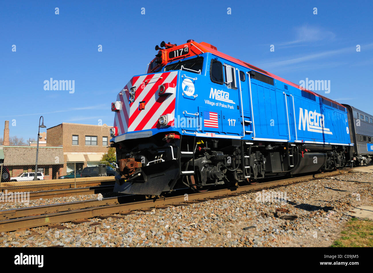 A Metra commuter train arriving at the suburban Chicago station of ...