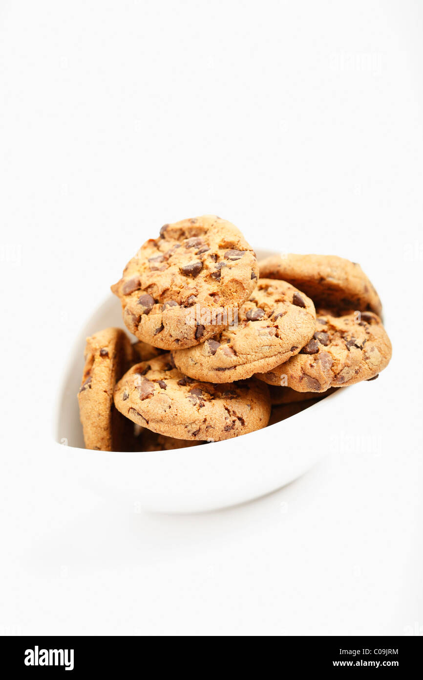 Chocolate cookies in bowl Cut Out Stock Images & Pictures - Alamy