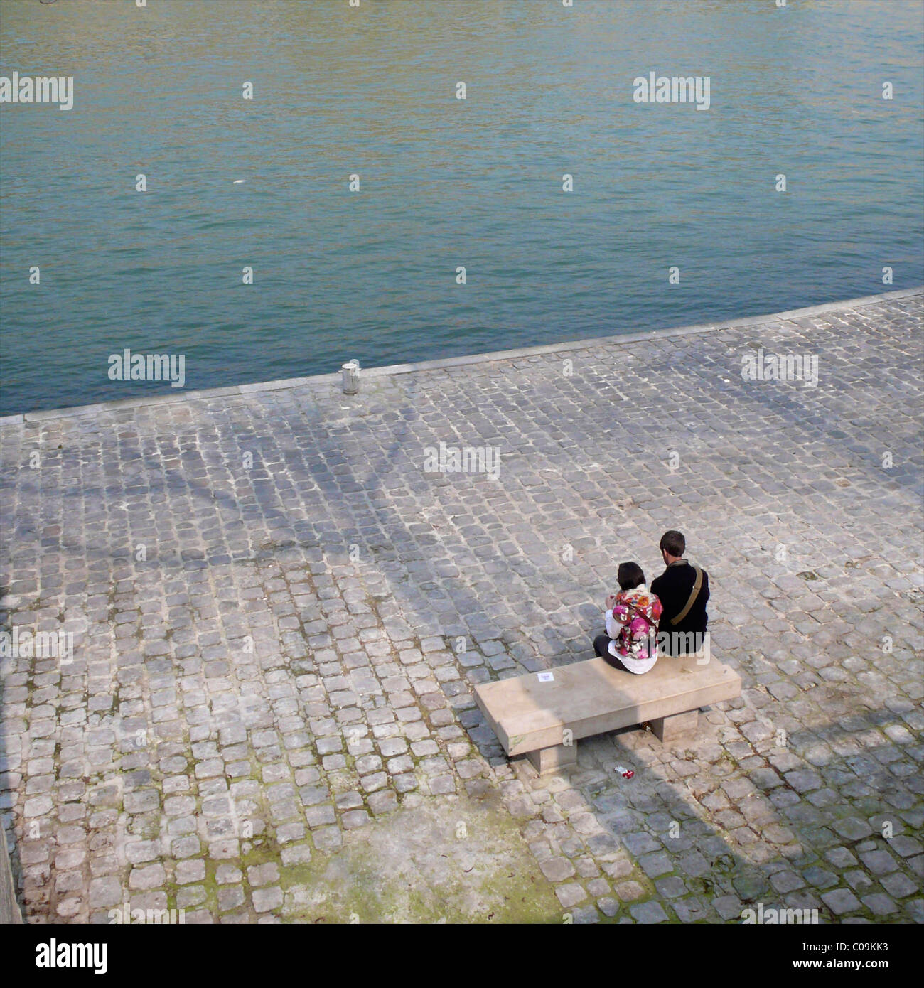 Lovers in Paris alone by the river Seine Stock Photo - Alamy