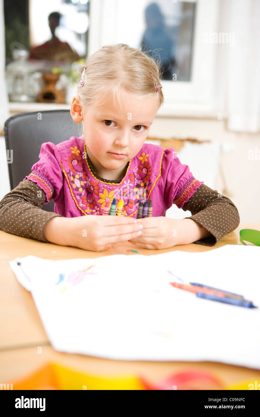 A girl holding her wax crayons Stock Photo - Alamy A girl holding her wax crayons Stock Photo - Alamy