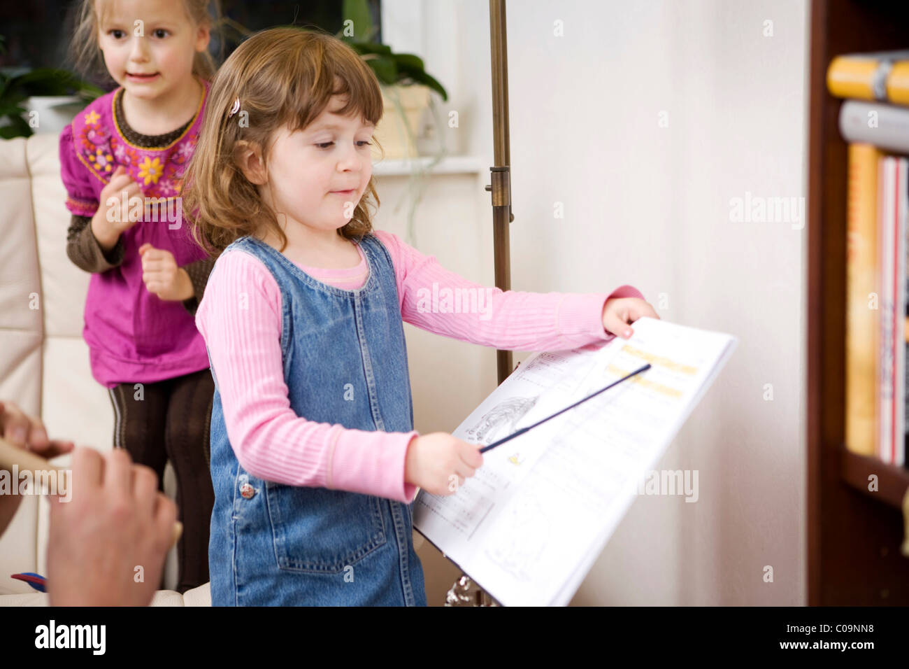 Two girls making music Stock Photo - Alamy