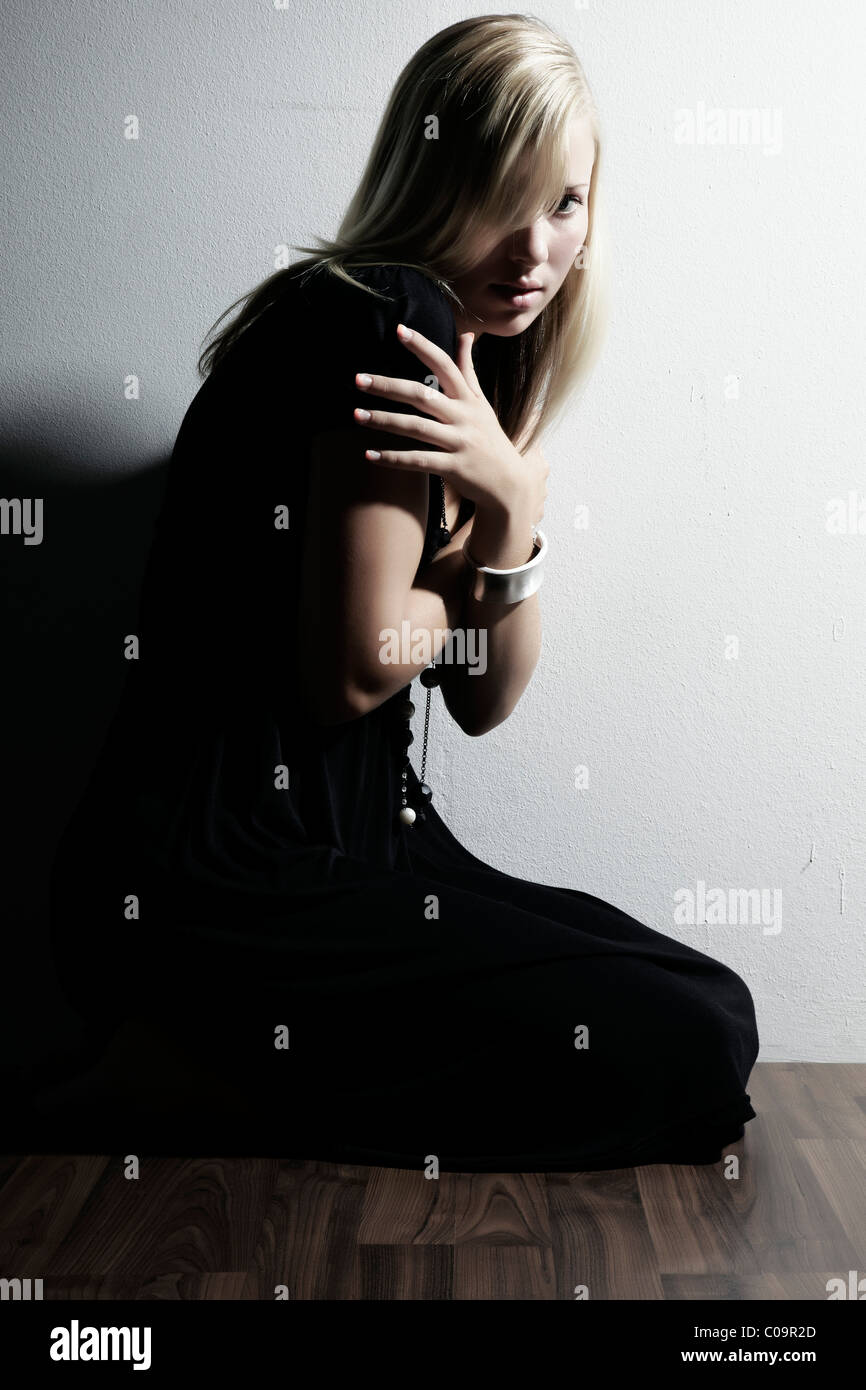 Hands over her chest hi-res stock photography and images - Alamy