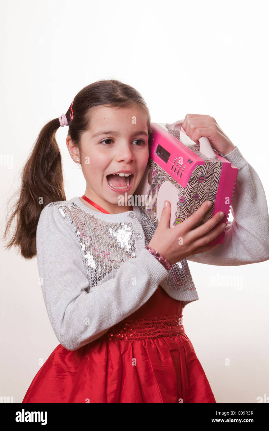 happy girl listening to a radio alone Stock Photo - Alamy