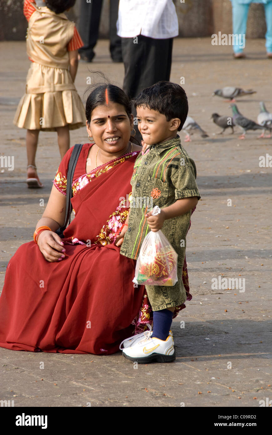 India, Maharashtra, Mumbai (aka Bombay). Indian woman in typical attire ...