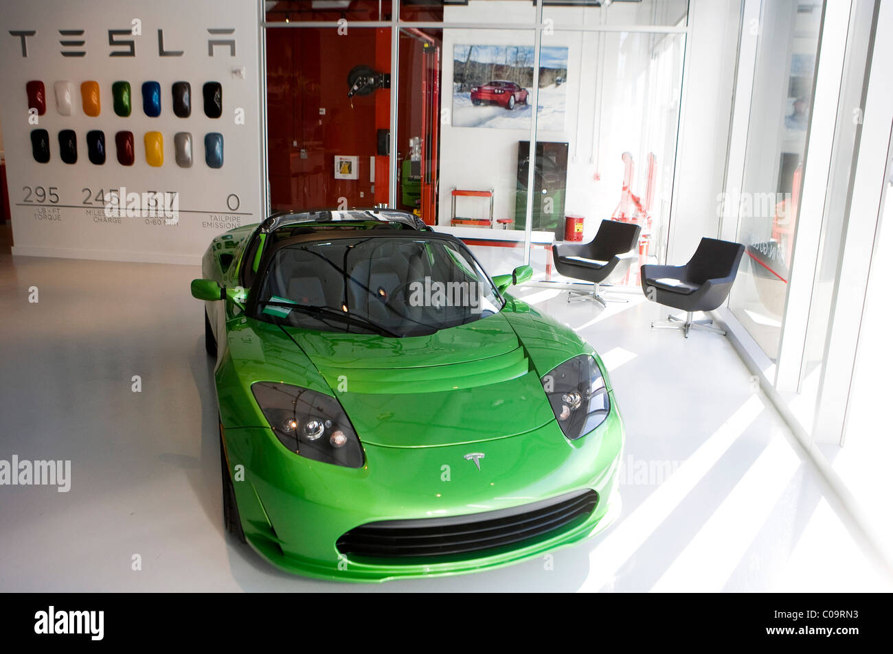 A Tesla all electric car dealership showroom Stock Photo - Alamy