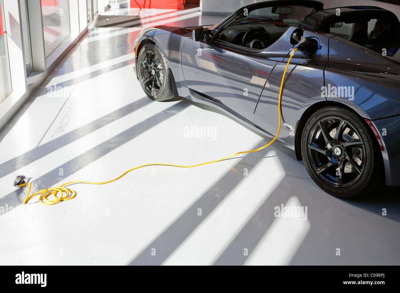 A Tesla all electric car dealership showroom Stock Photo - Alamy