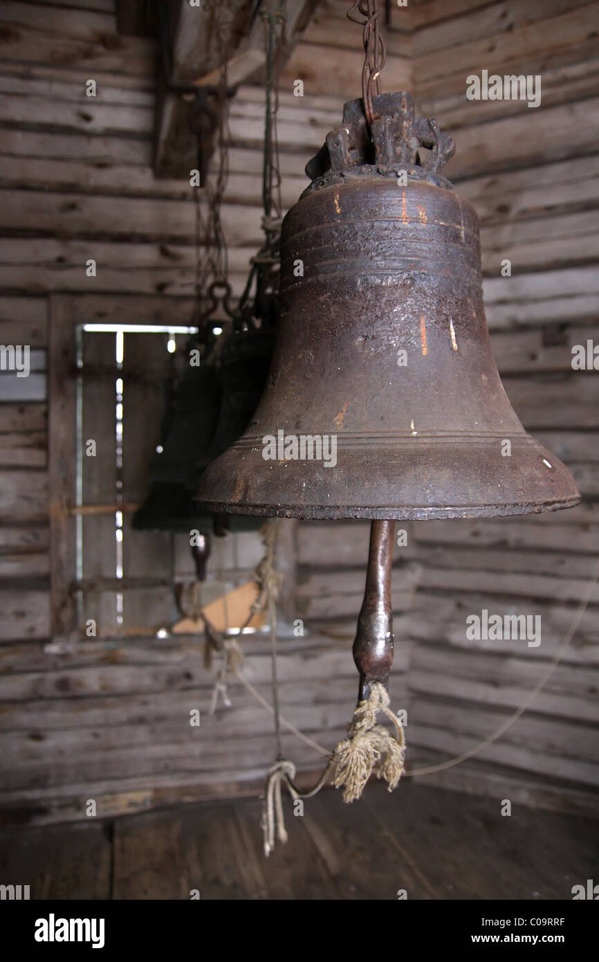 Old bell in the wooden church Stock Photo - Alamy