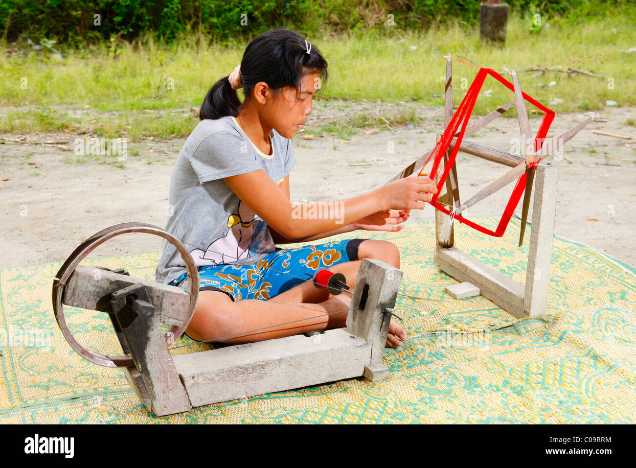 Female spinner, Batak culture, Samosir Island, Lake Toba, Batak region ...