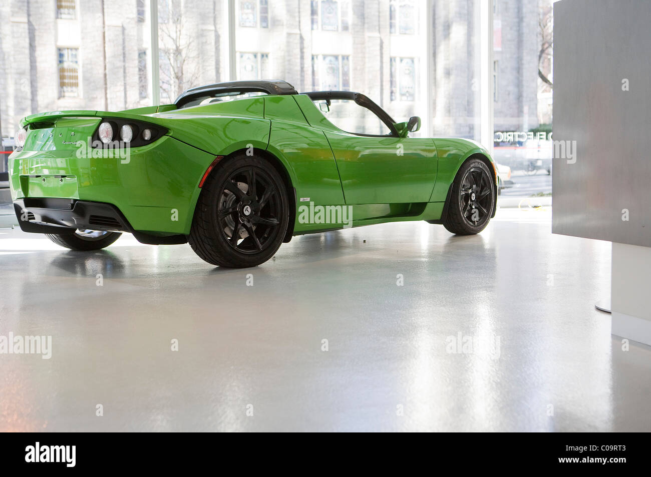 A Tesla all electric car dealership showroom Stock Photo - Alamy