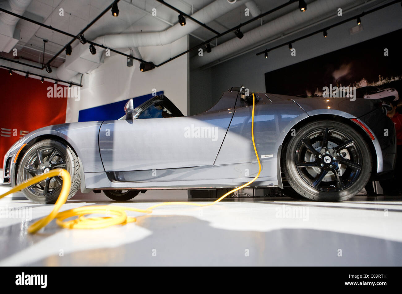 A Tesla all electric car dealership showroom Stock Photo - Alamy