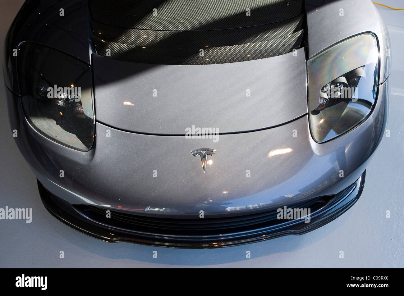 A Tesla all electric car dealership showroom Stock Photo - Alamy